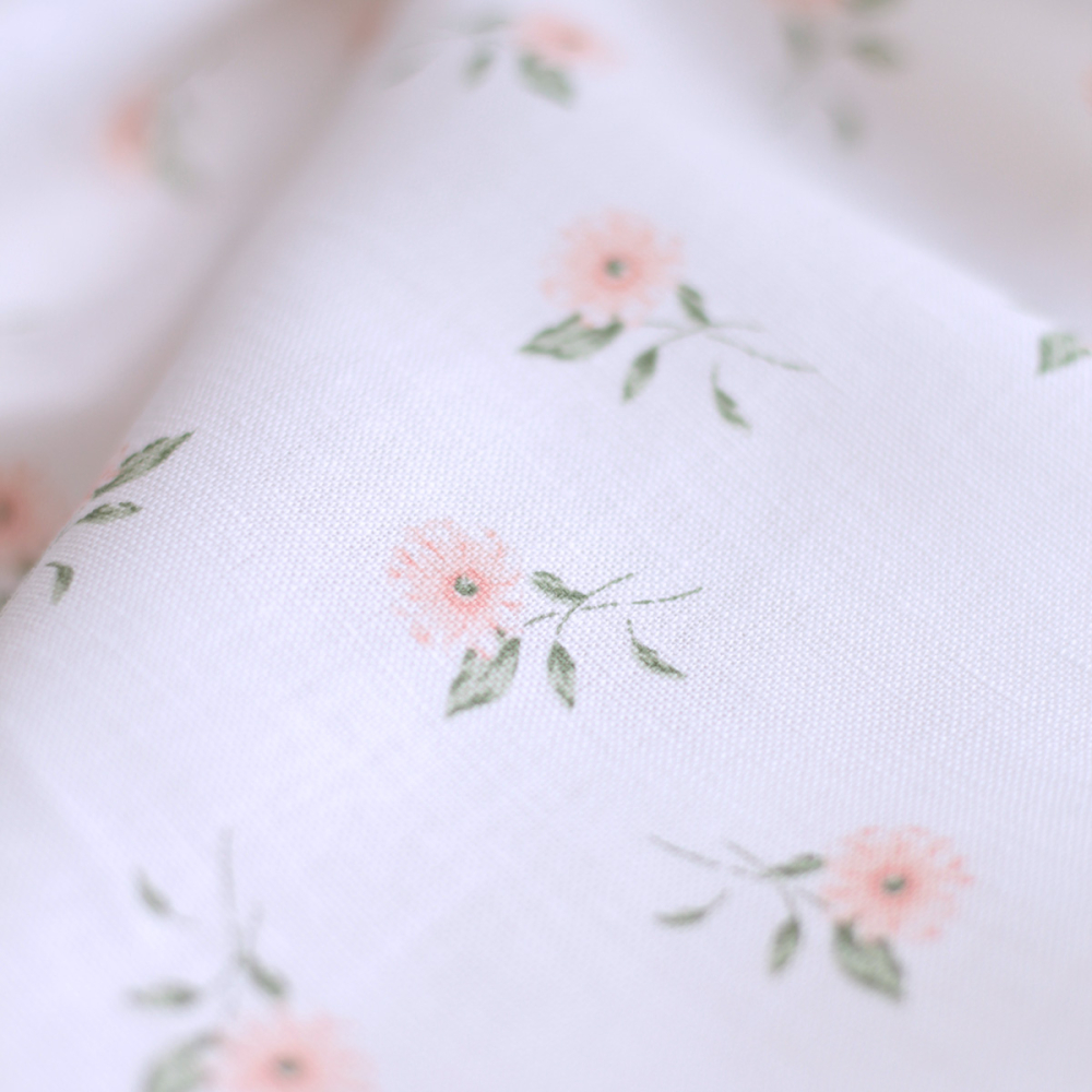 Tissu mélange lin coton fluide été frais corail motifs paquerettes