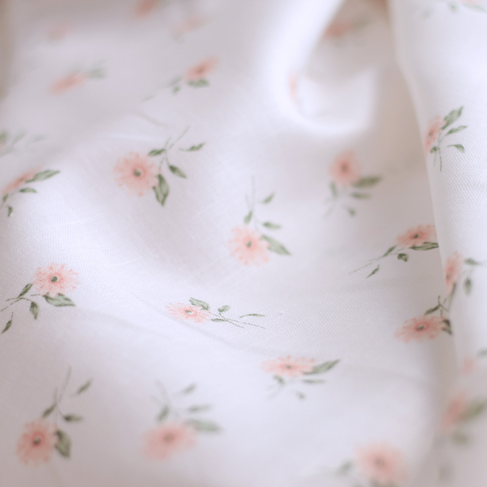 Tissu mélange lin coton fluide été frais corail motifs paquerettes